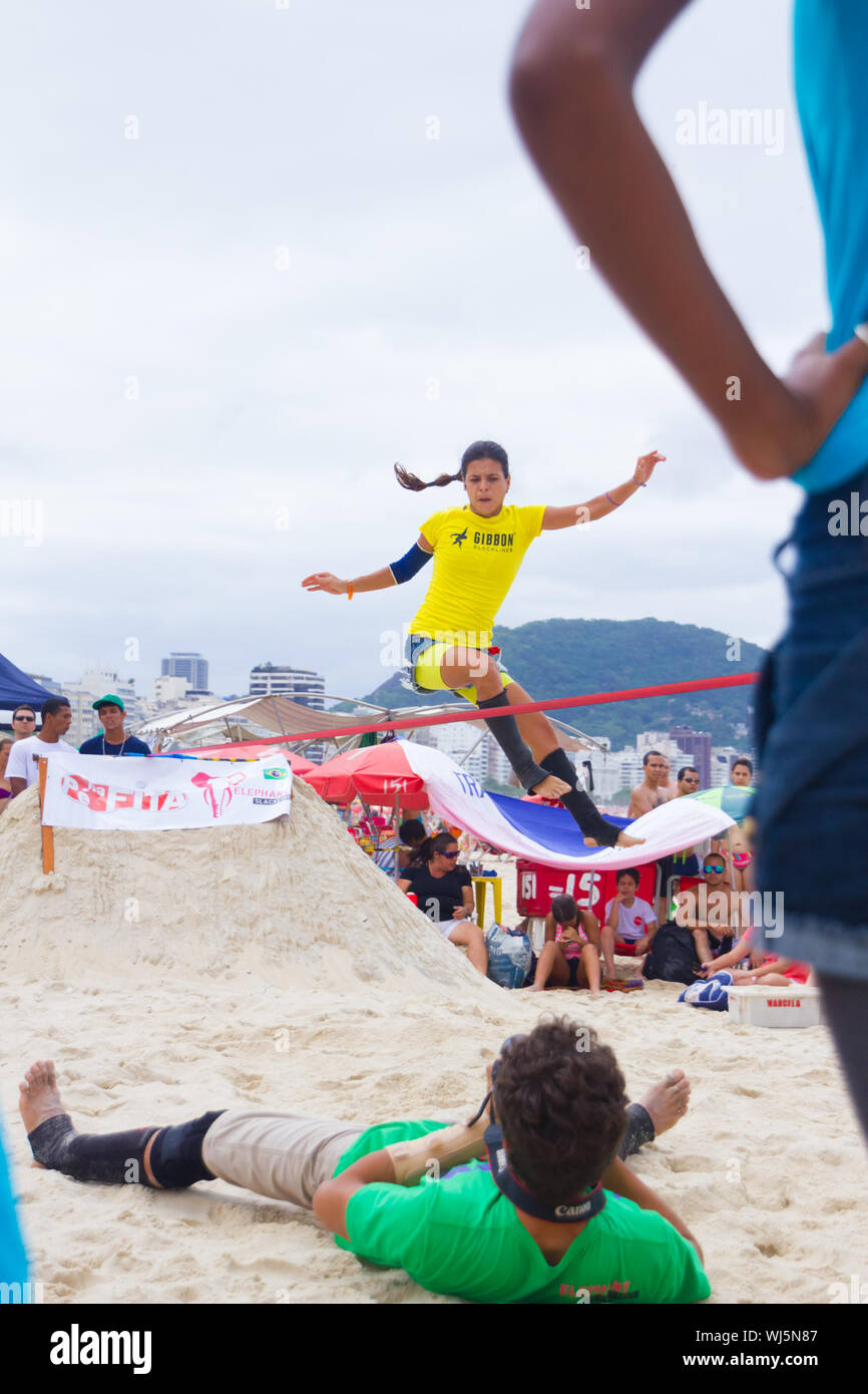 Slackline on Copacabana beach, Rio de Janeiro, Brazil Stock Photo - Alamy