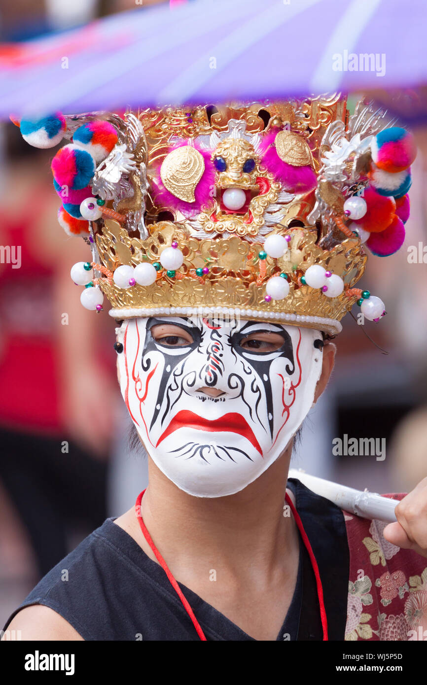 Actor wearing a traditional Japanese mask Stock Photo - Alamy