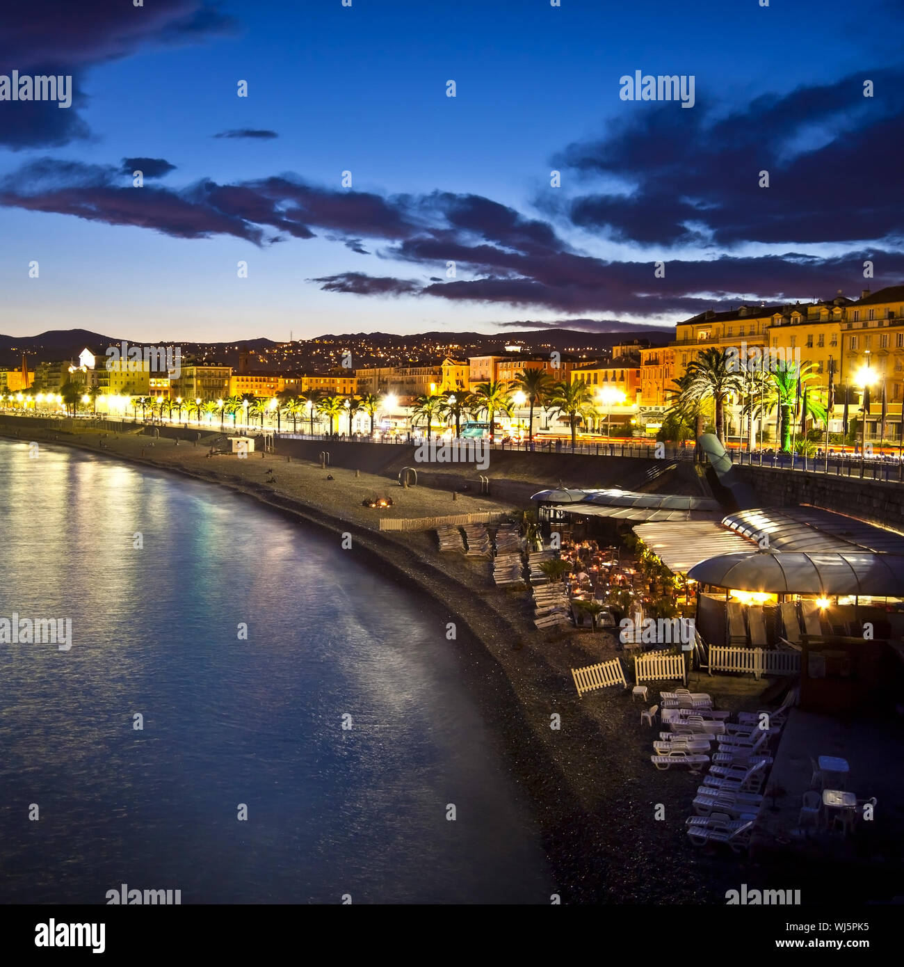 The beach and the waterfront of Nice at night, France Stock Photo - Alamy