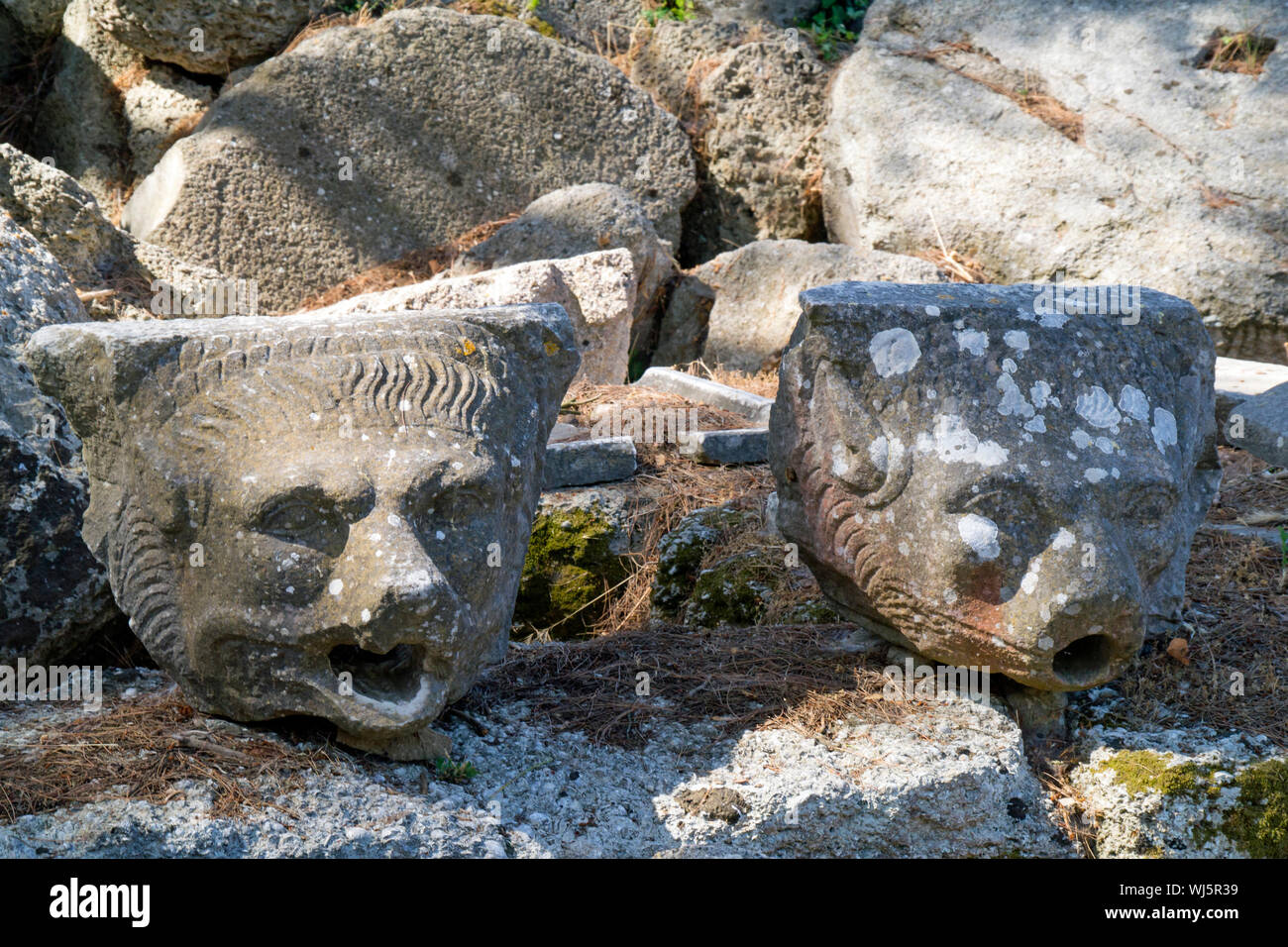 stone carved gargoyles, Ancient Olympia, site of the original Olympic ...