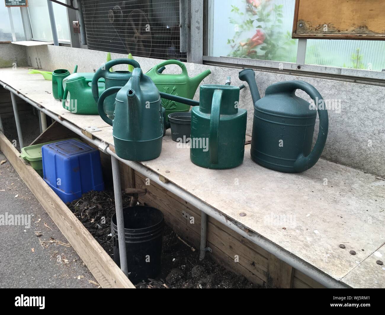 Collection of watering cans hi-res stock photography and images - Alamy