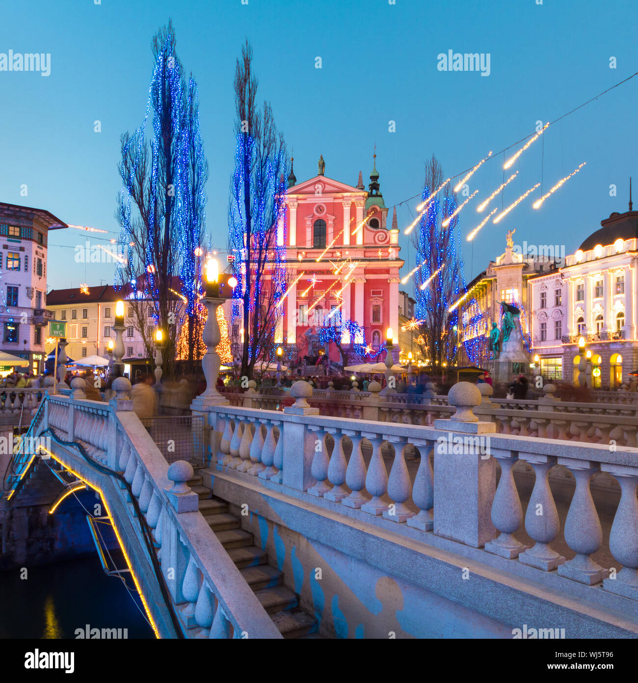 Romantic Ljubljana's city center decorated for Christmas time. River ...