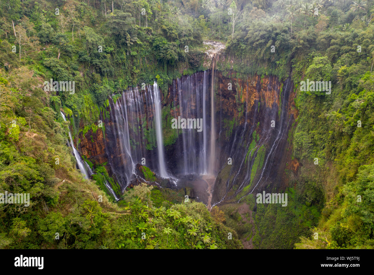 Aerial drone image of Tumpak Sewu waterfall in Eastern Java, Indonesia ...