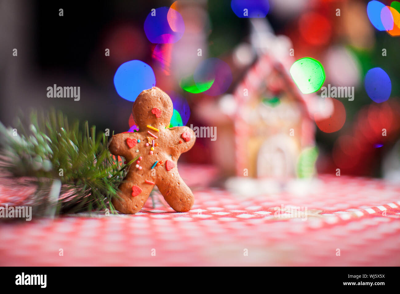 Close-up of gingerbread man background candy ginger house and Christmas ...