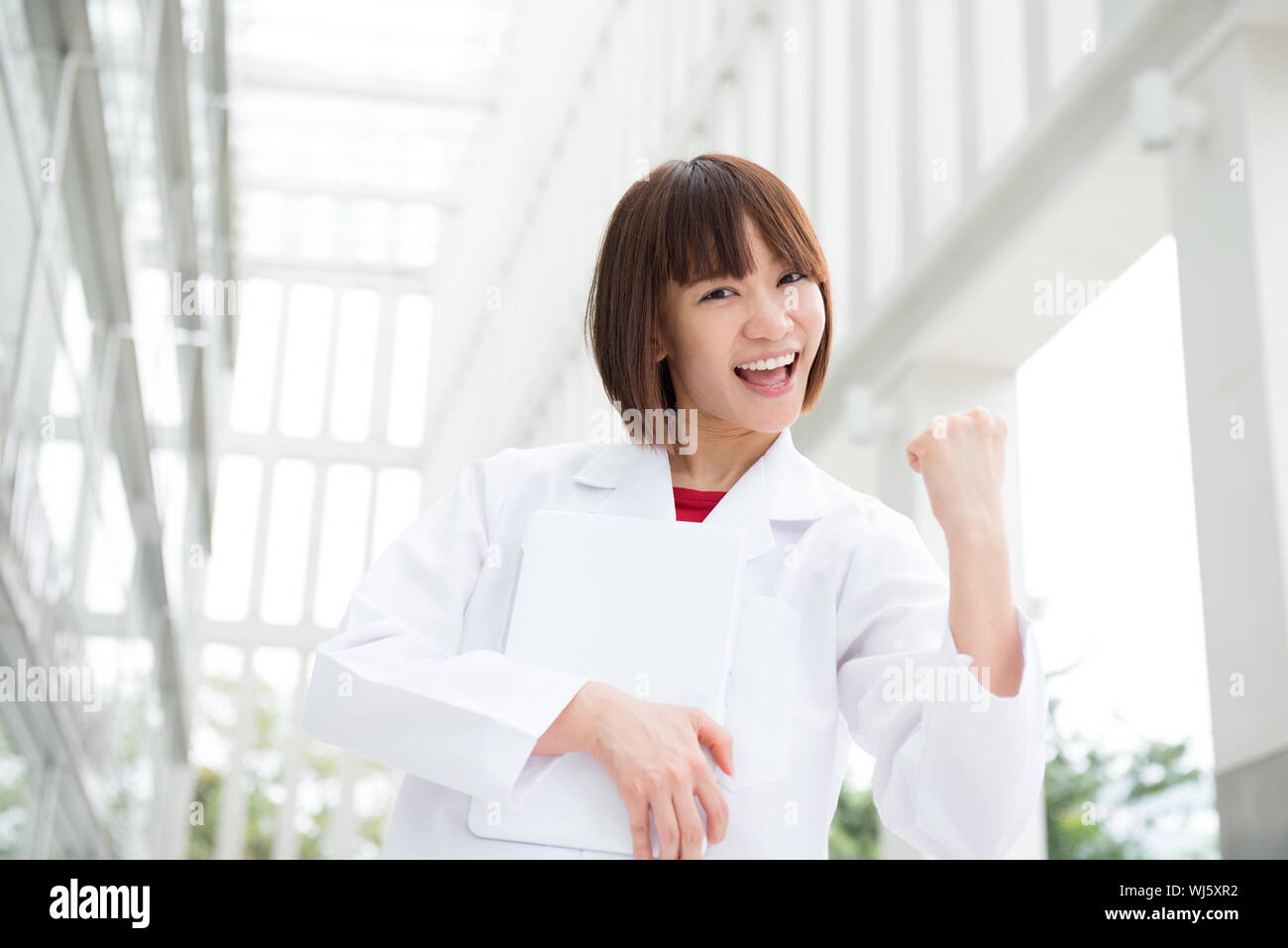 Asian Chinese medical people at the hospital celebrating success Stock ...