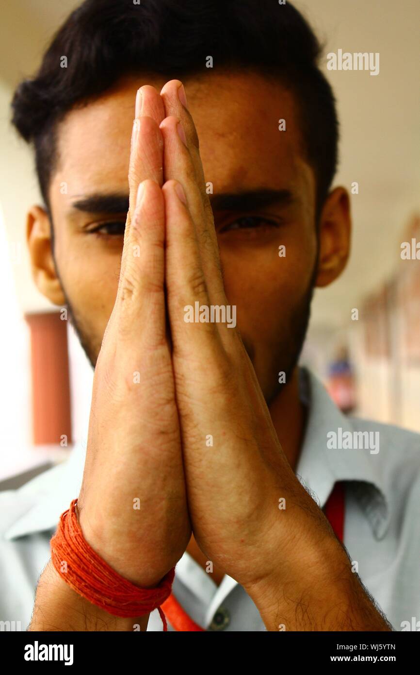 Hands clasped in front of body hi-res stock photography and images - Alamy