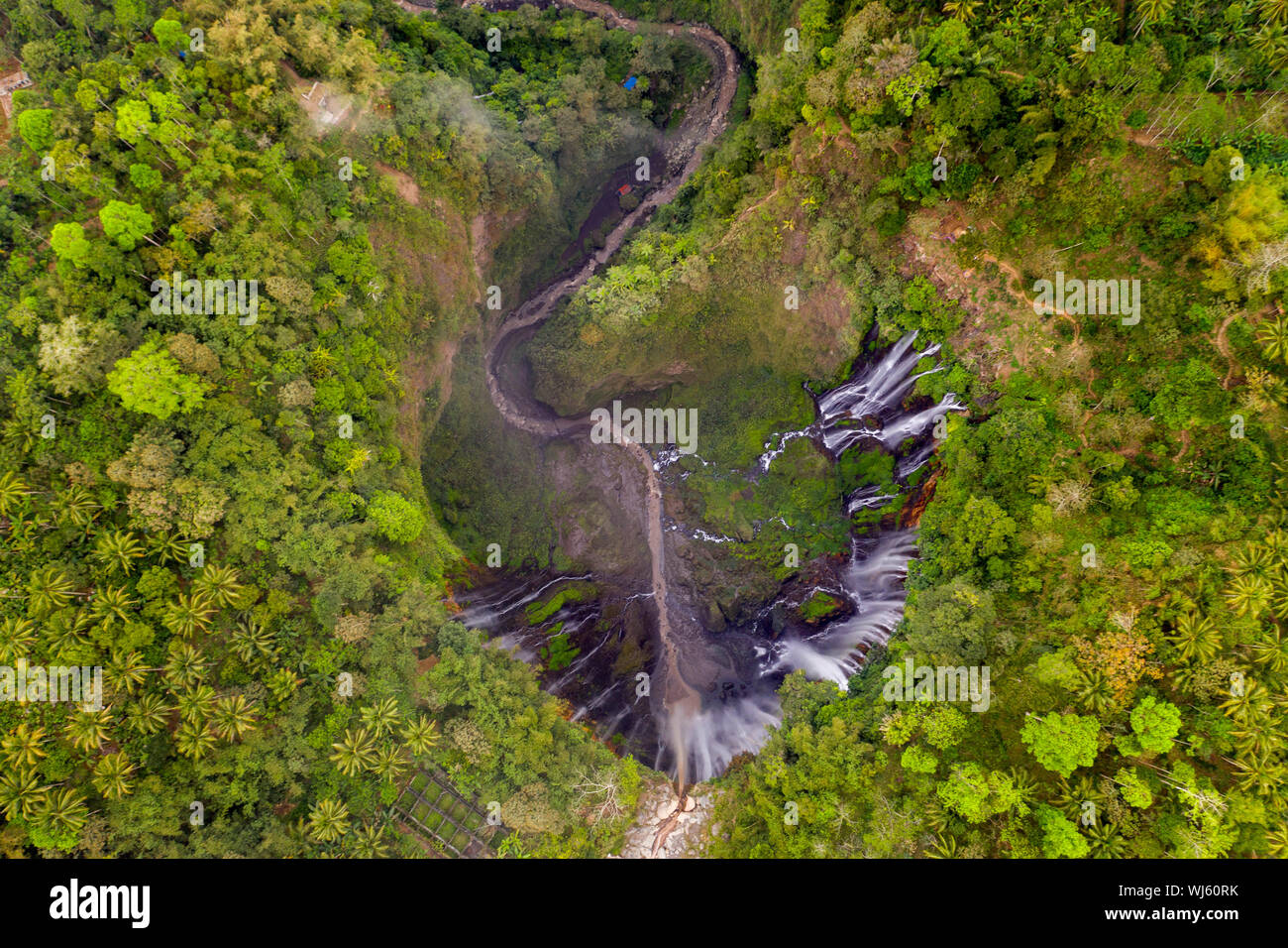Aerial drone image of Tumpak Sewu waterfall in Eastern Java, Indonesia ...