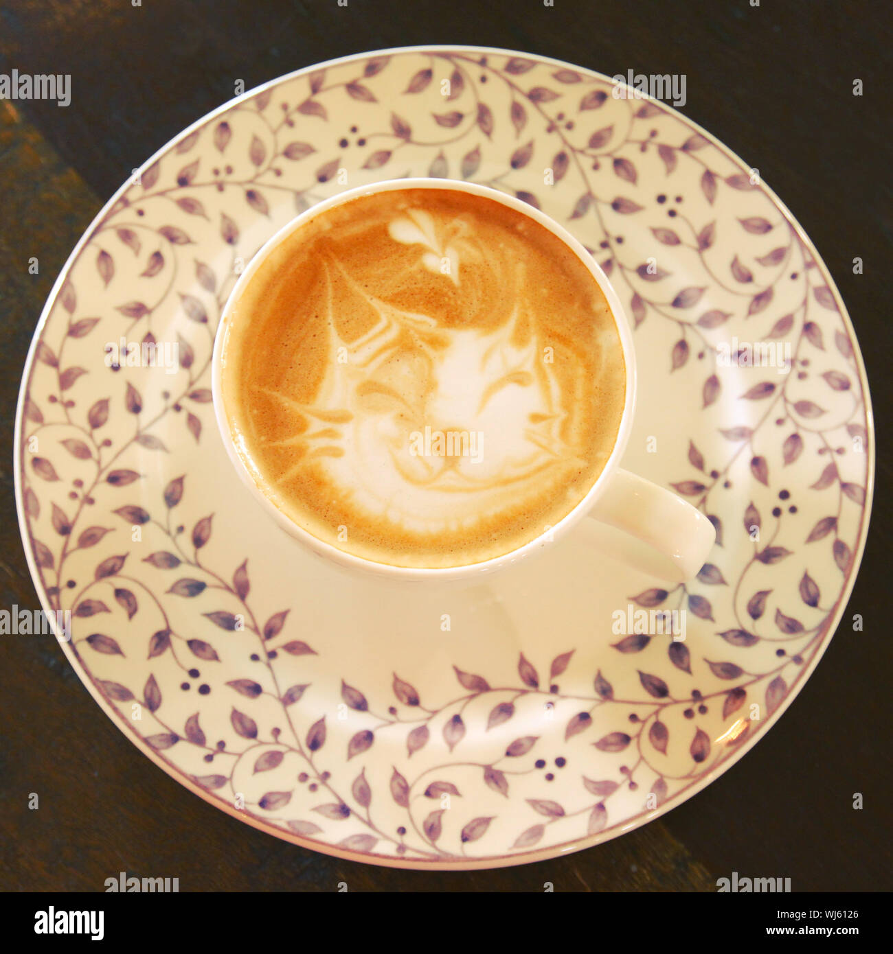 Cute latte art coffee with cat face, retro filter effect Stock Photo ...
