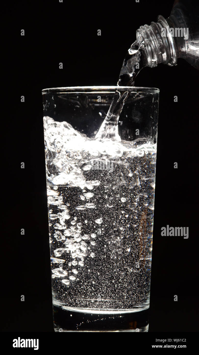 Water poured from bottle hi-res stock photography and images - Alamy