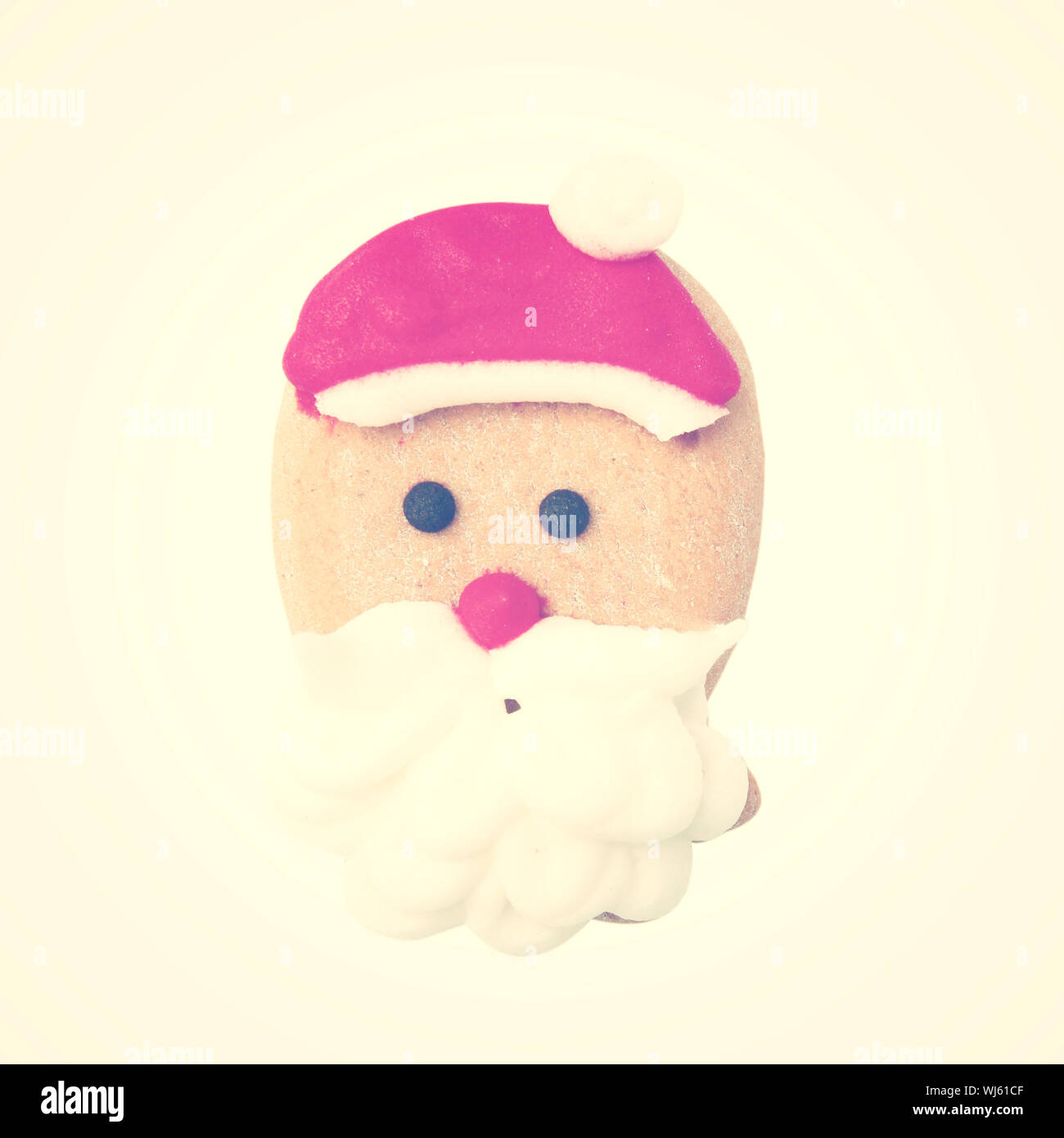 Santa gingerbread cookie with retro filter effect Stock Photo - Alamy