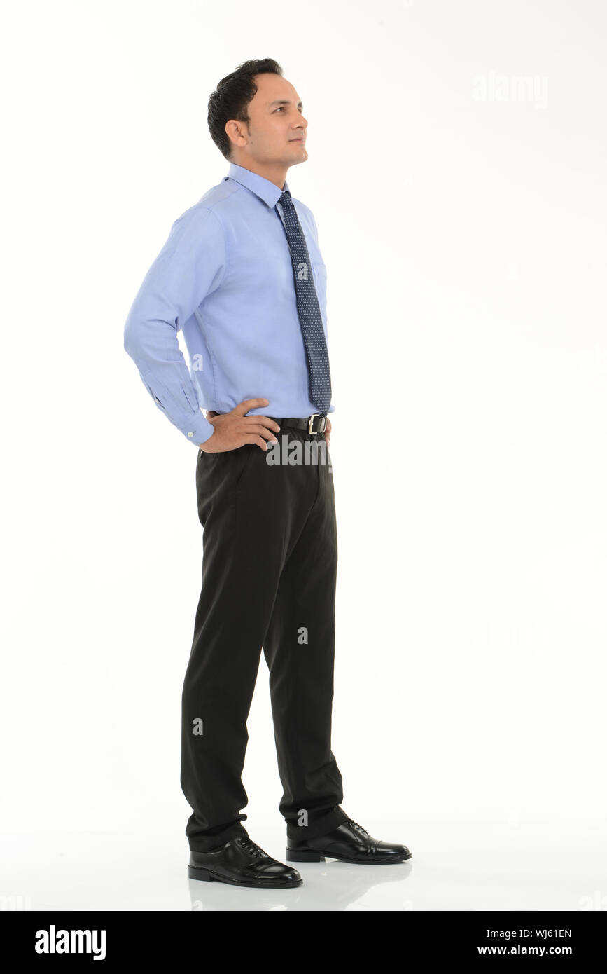 Confidence arms akimbo man hi-res stock photography and images - Alamy