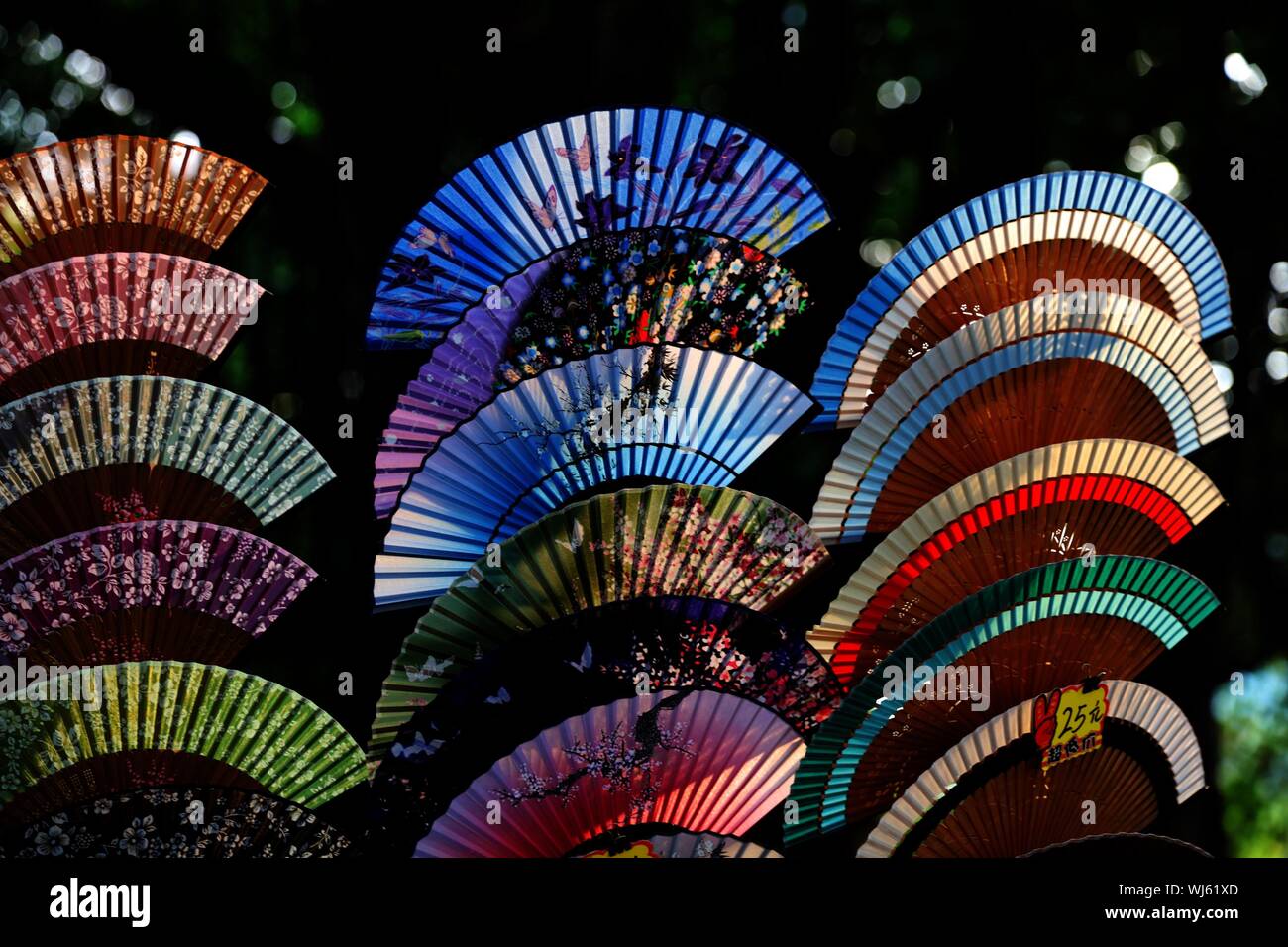 Hand fans hi-res stock photography and images - Alamy