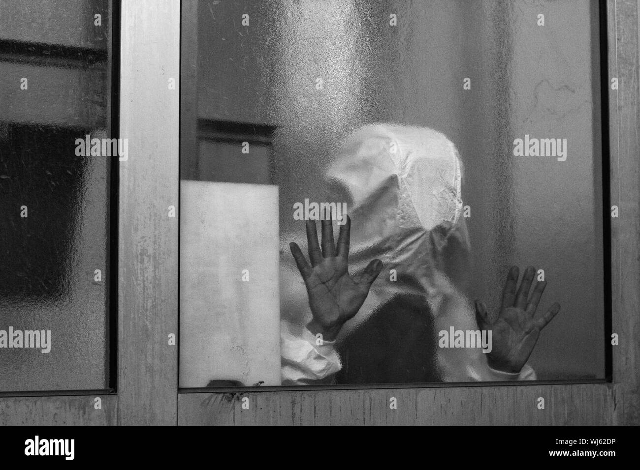 Face obscured behind glass hi-res stock photography and images - Alamy