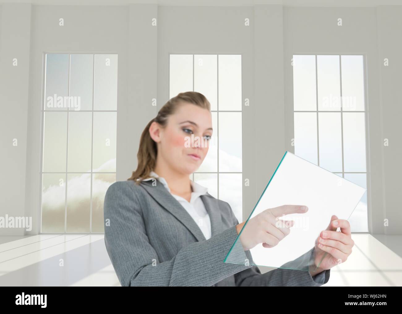 Composite image of woman pressing something on the pane in bright 3d ...