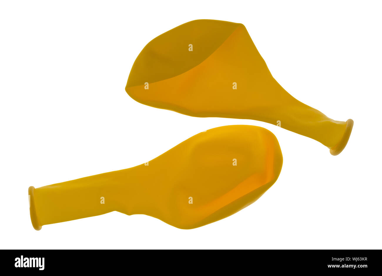 Two new uninflated yellow balloons isolated on a white background Stock ...