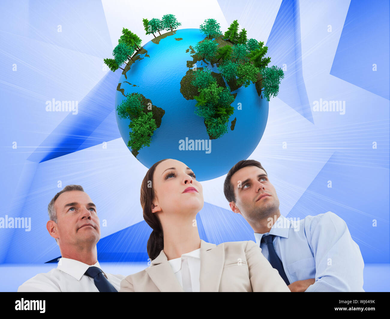 Composite image of serious work team posing together looking away on ...