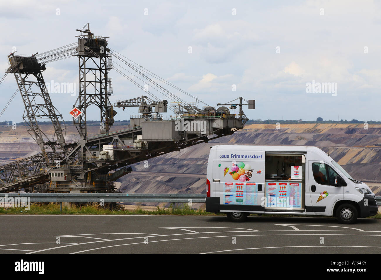 Brown coal excavator and ice cream van at the viewpoint Jackerath ...