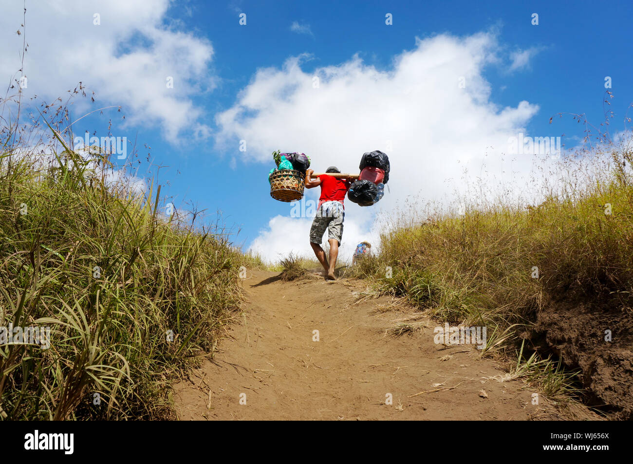 Men Carrying Baskets High Resolution Stock Photography and Images - Alamy