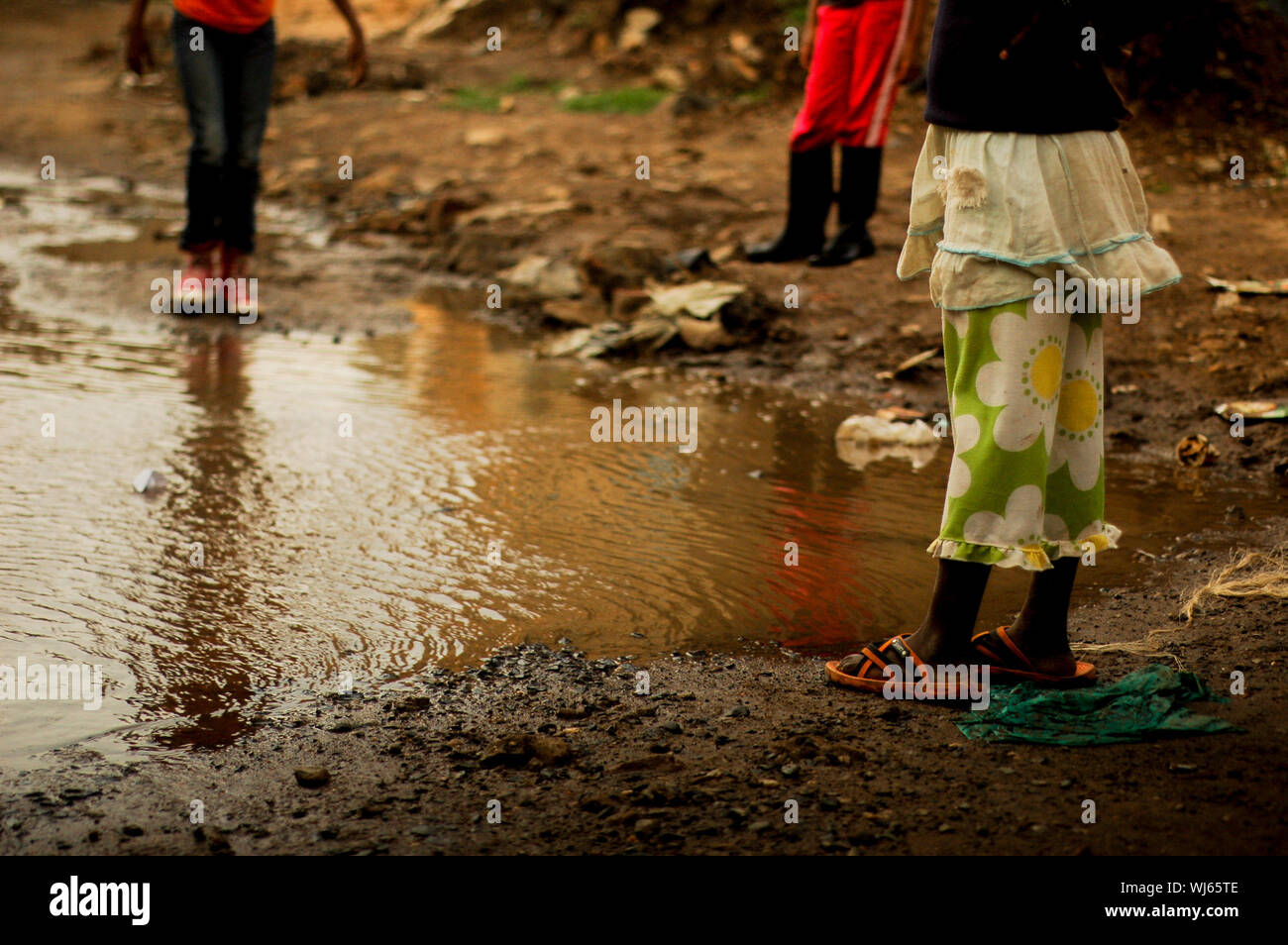 Children Playing In Puddle High Resolution Stock Photography and Images ...