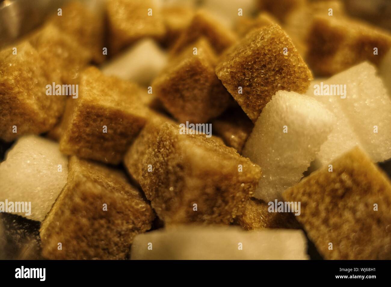 Sugar cubes eat hi-res stock photography and images - Alamy