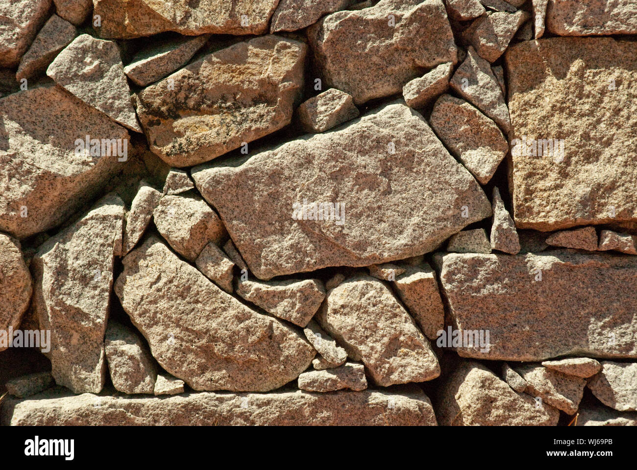 Granite surface background shot with natural light Stock Photo - Alamy