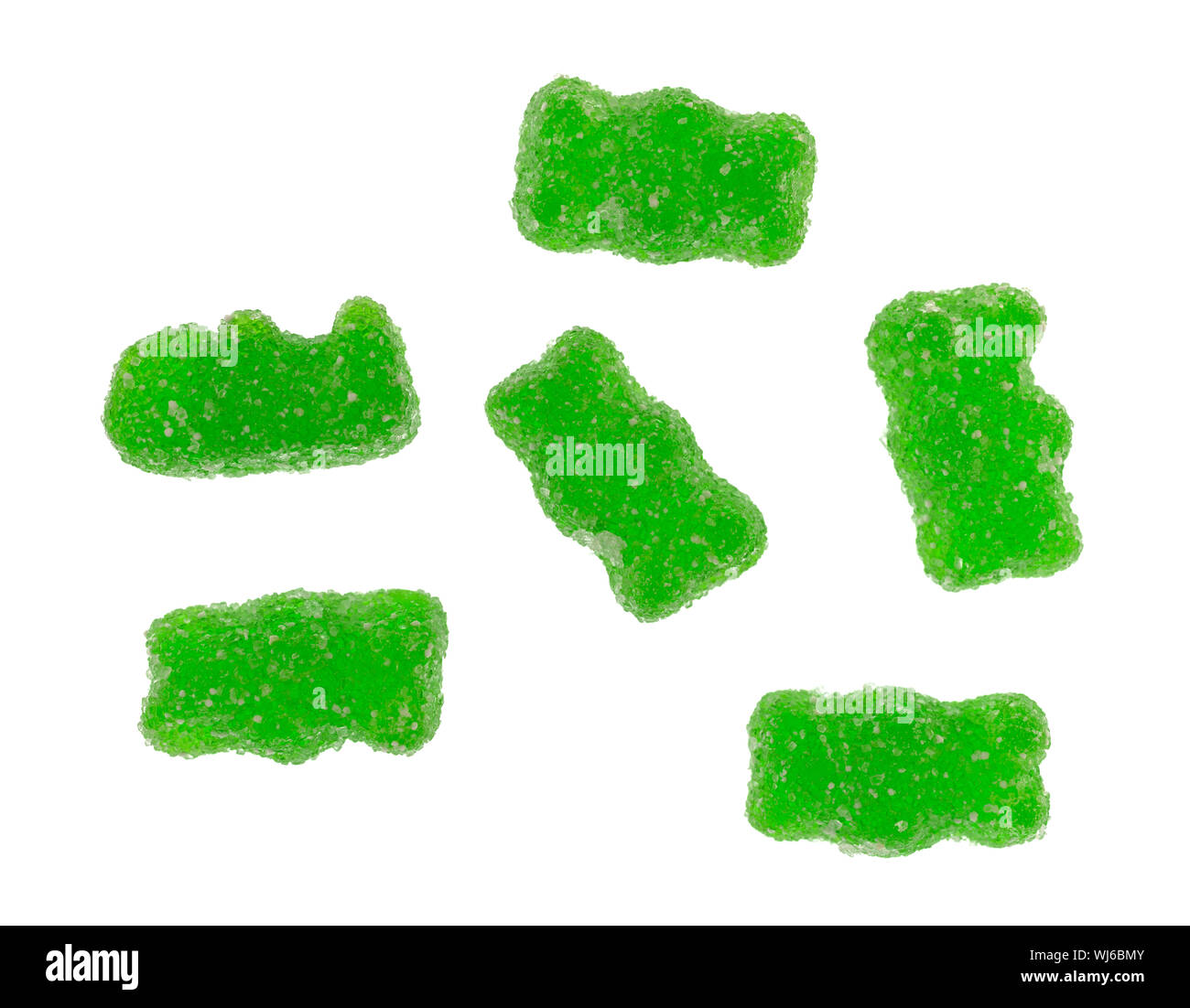 Top view of a small group of green generic sugar coated gummy bears ...
