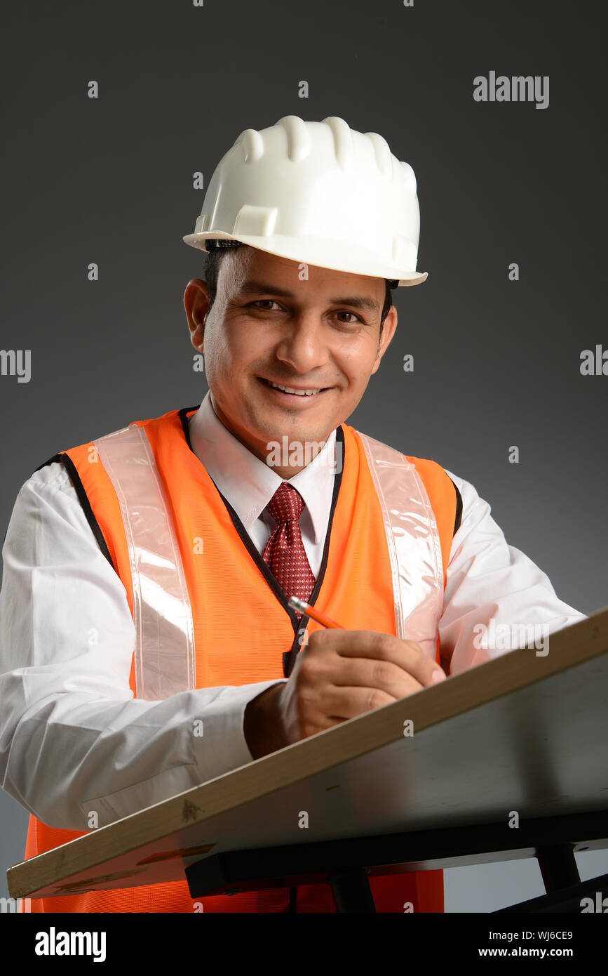 Smiling civil engineer standing in hi-res stock photography and images ...