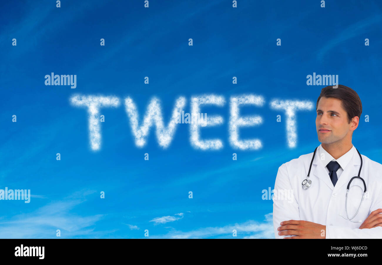 Composite image of confident doctor with arms crossed looking up Stock ...