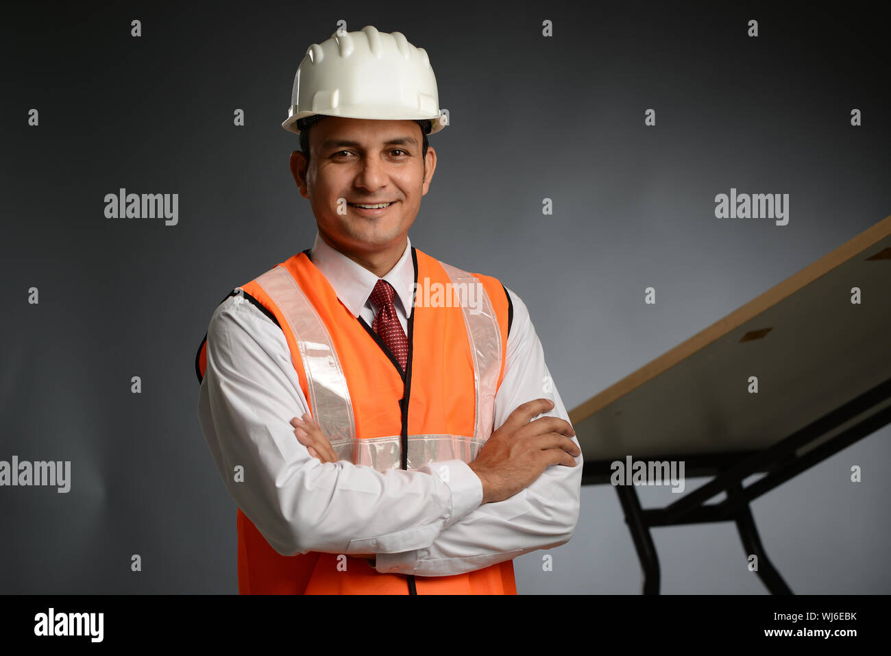 Smiling civil engineer standing hi-res stock photography and images - Alamy