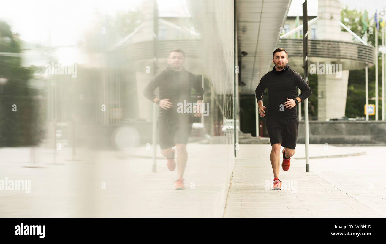 Guy running into building hi-res stock photography and images - Alamy