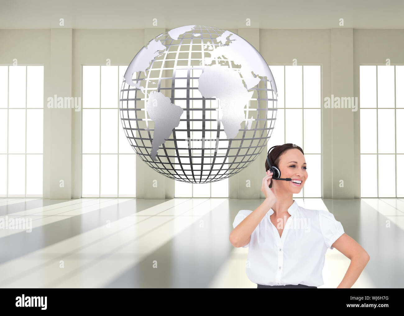 Composite image of cheerful smart call center agent working while ...