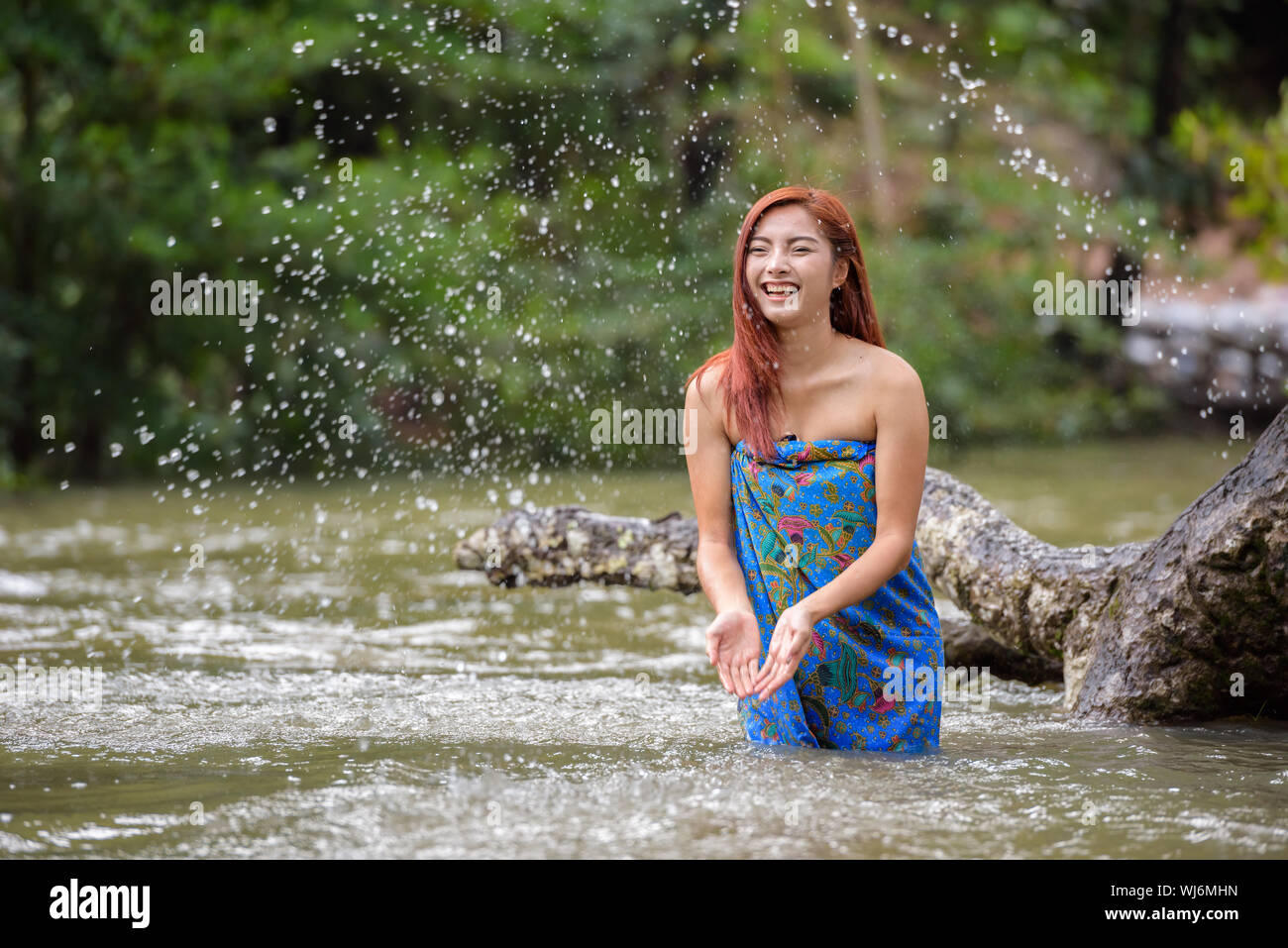 Woman in river water hi-res stock photography and images - Alamy