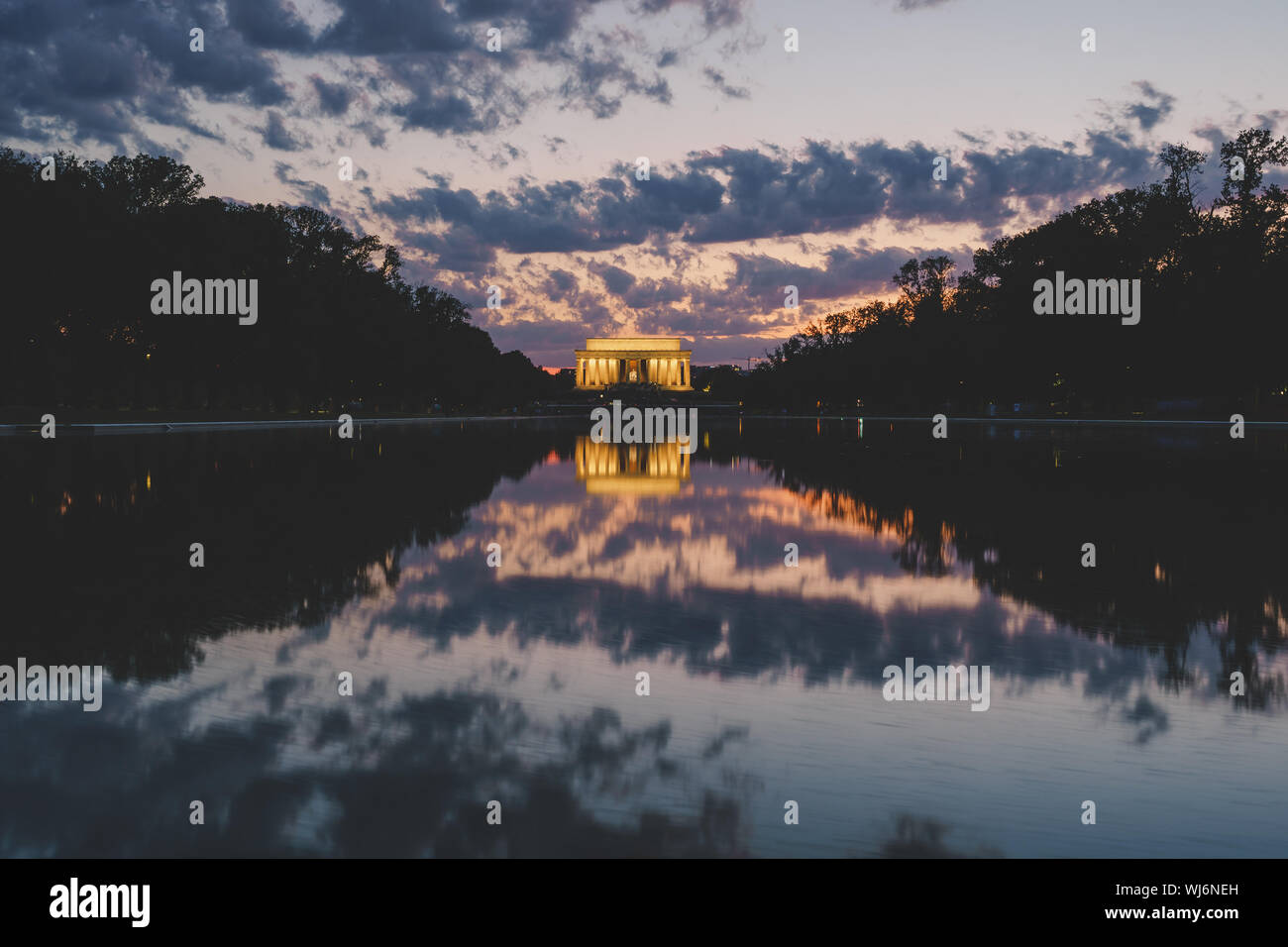Lincoln memorial reflected in the reflecting pool on the National Mall ...