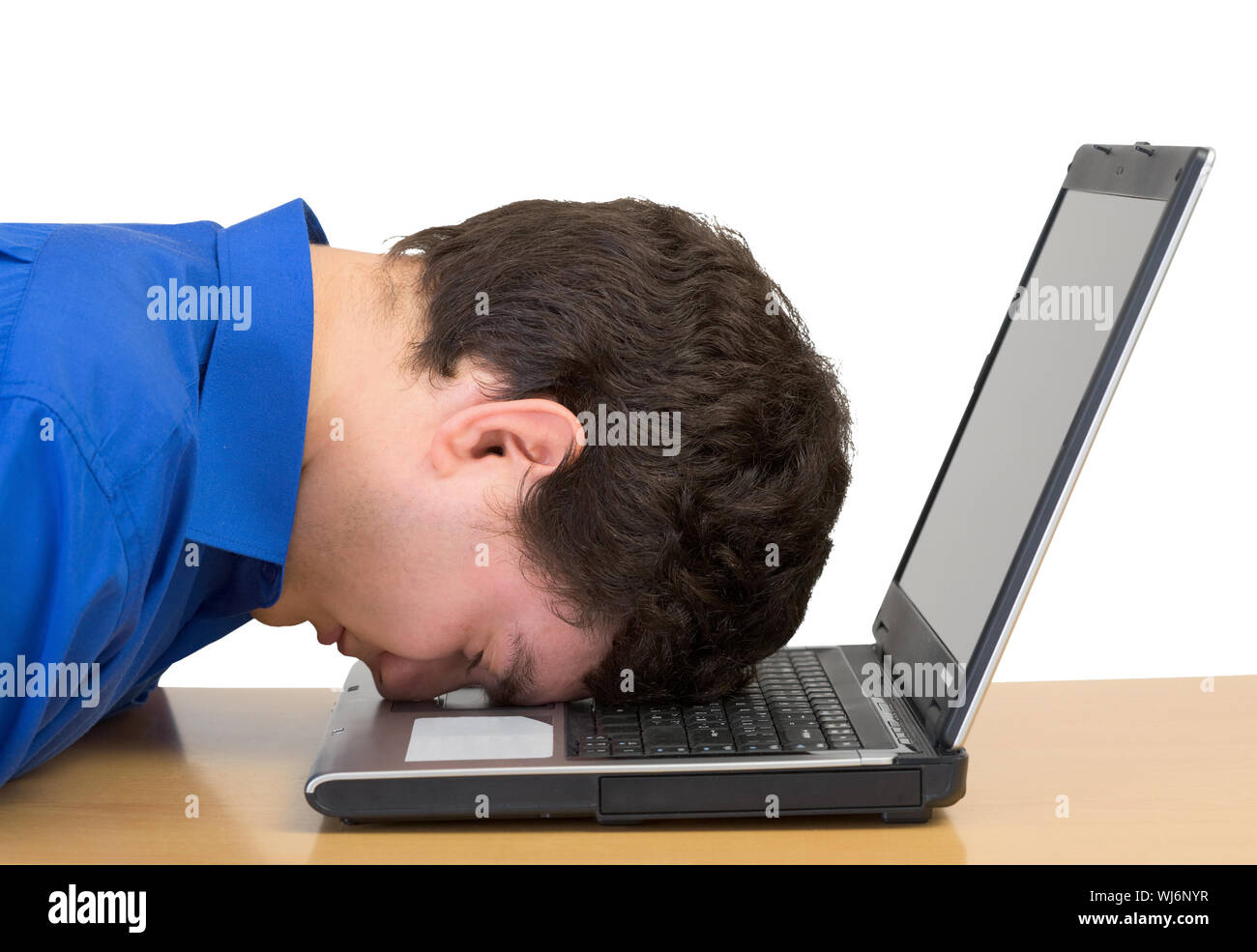 Young man and laptop on the white background Stock Photo - Alamy