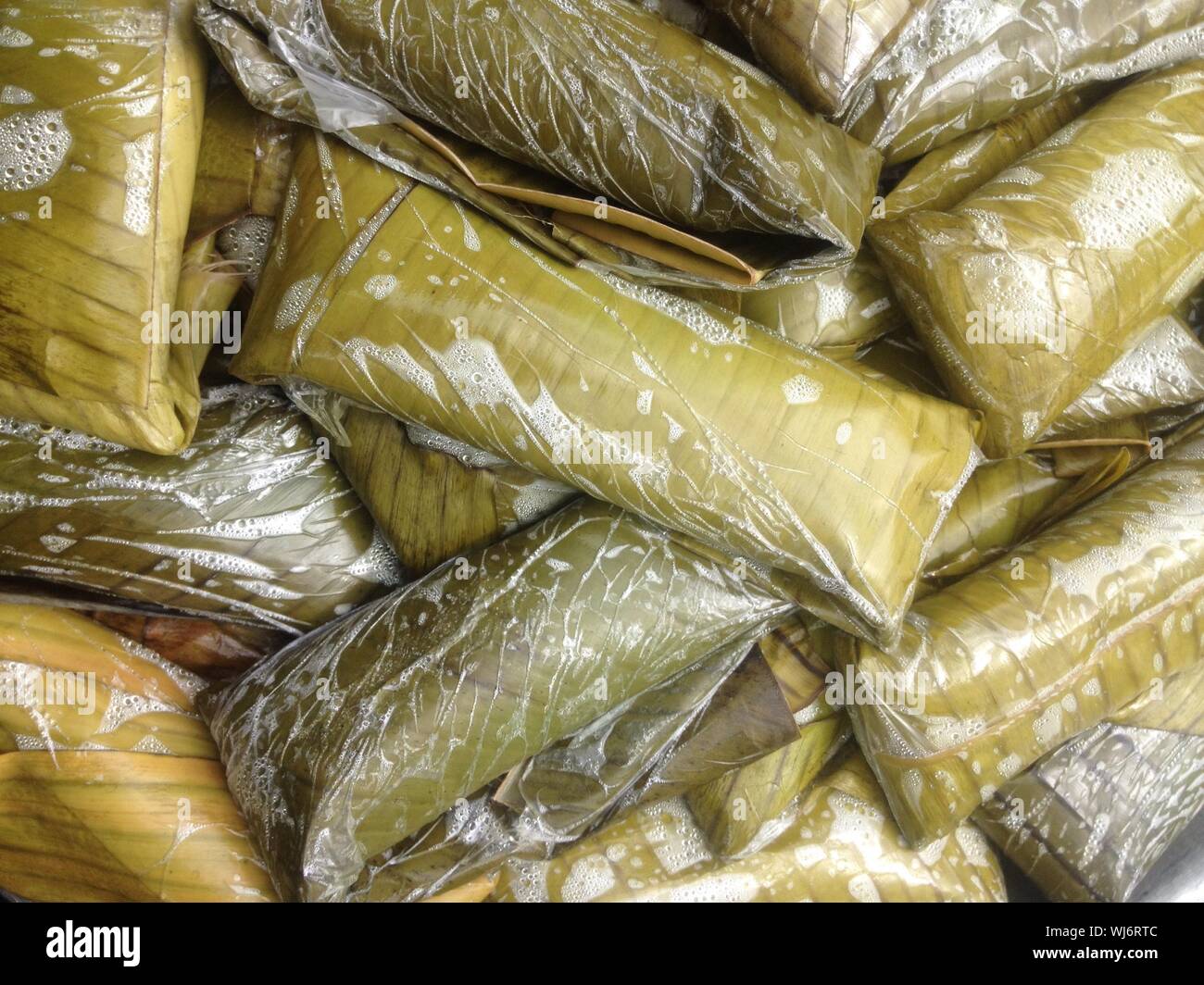 Banana leaf tamales hi-res stock photography and images - Alamy
