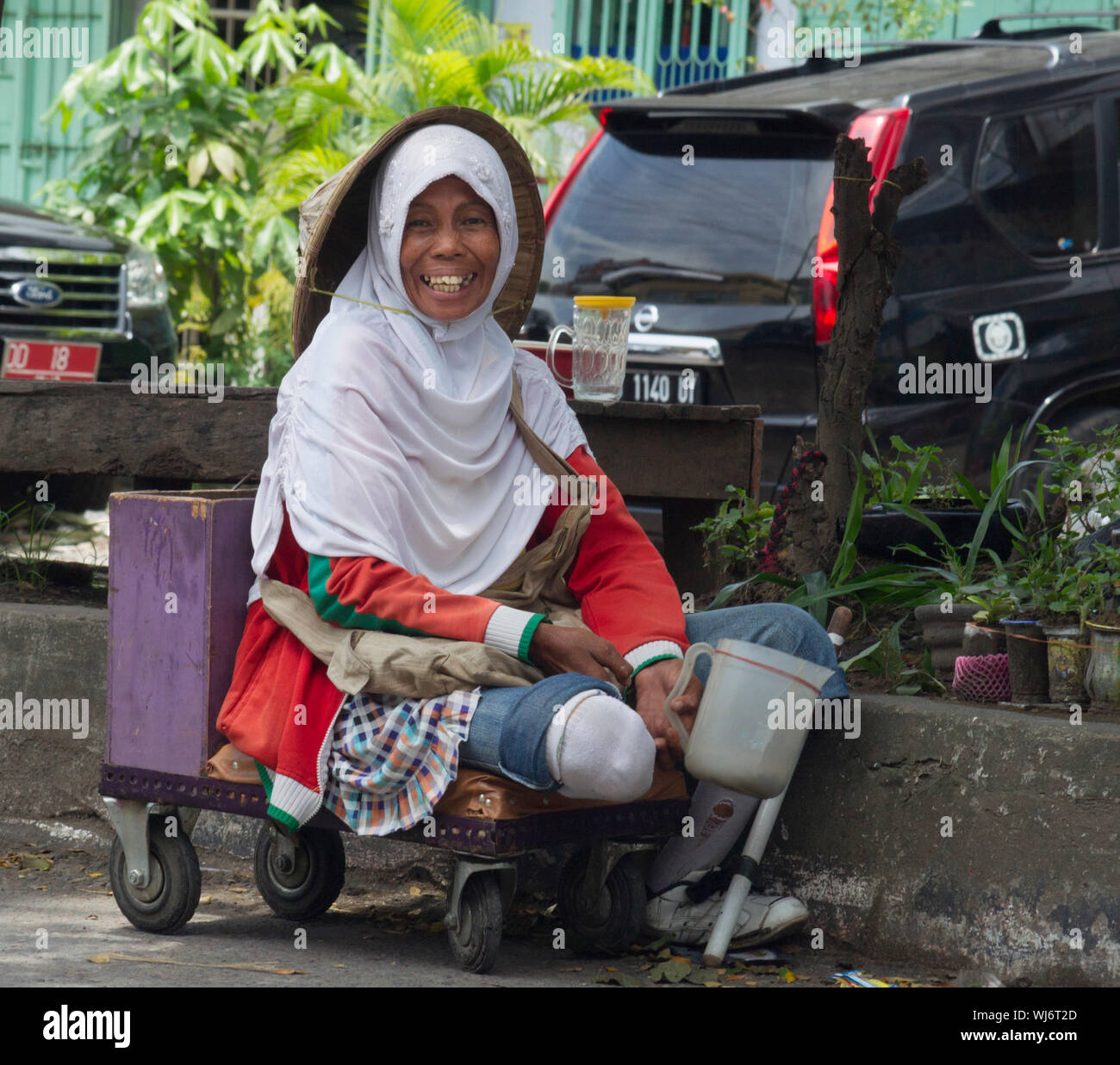 Roadside beggar, Makassar, Sulawesi, Indonesia, 2012 Stock Photo - Alamy
