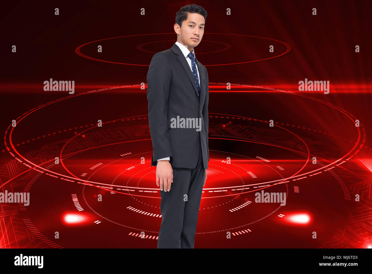 Composite image of frowning businessman looking at camera Stock Photo - Alamy