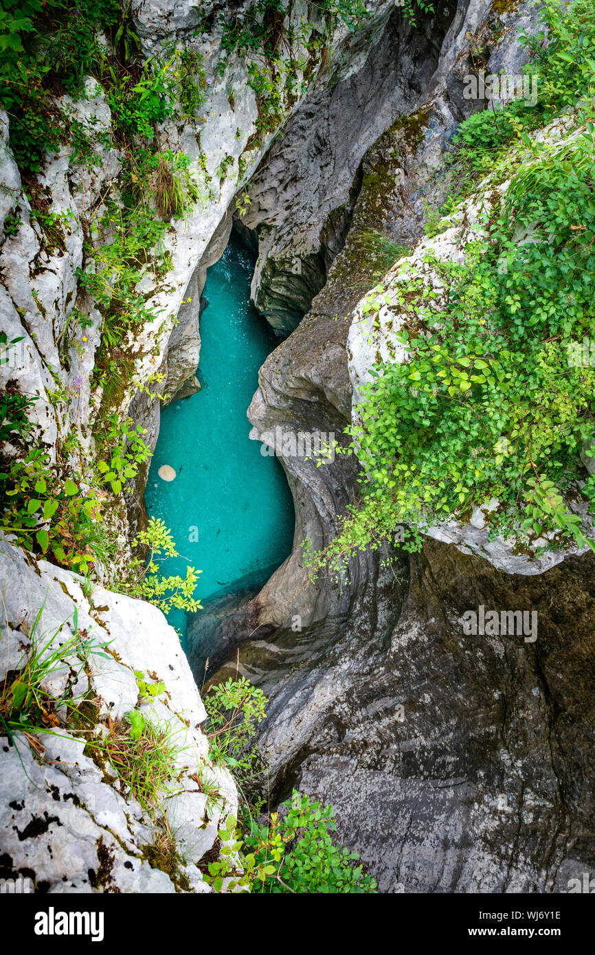 Soca gorge in Slovenia, a deep canyon with blue river Stock Photo - Alamy
