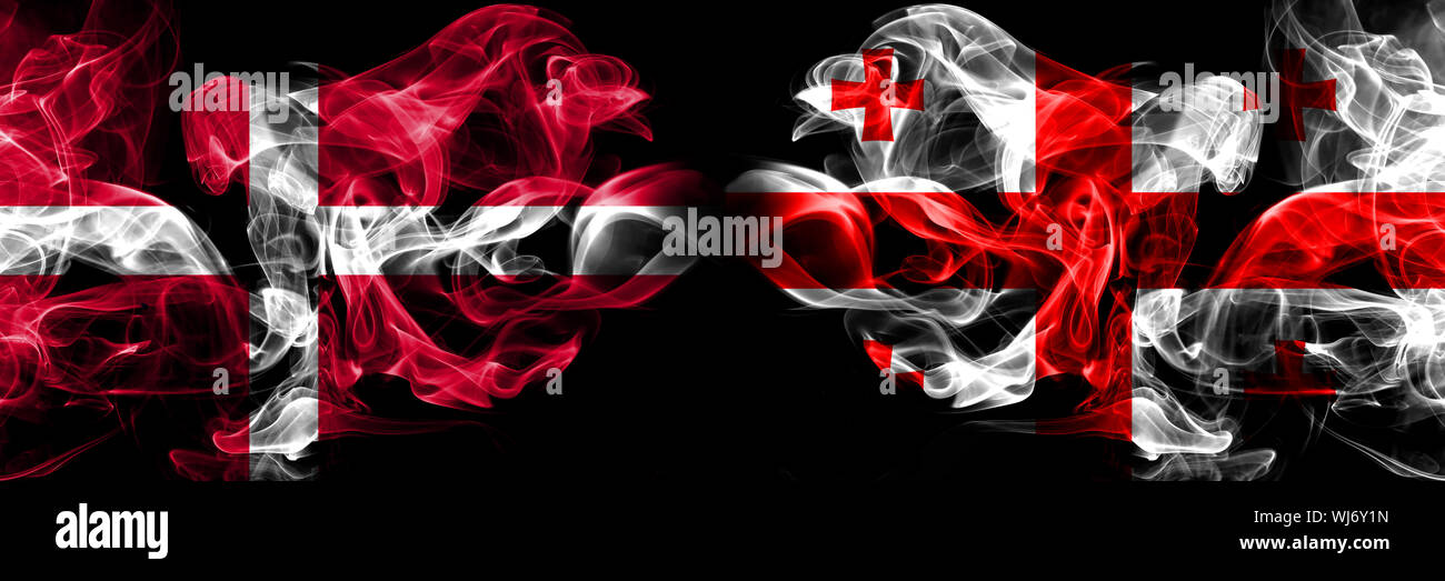 Denmark, Georgia competition thick colorful smoky flags. European ...