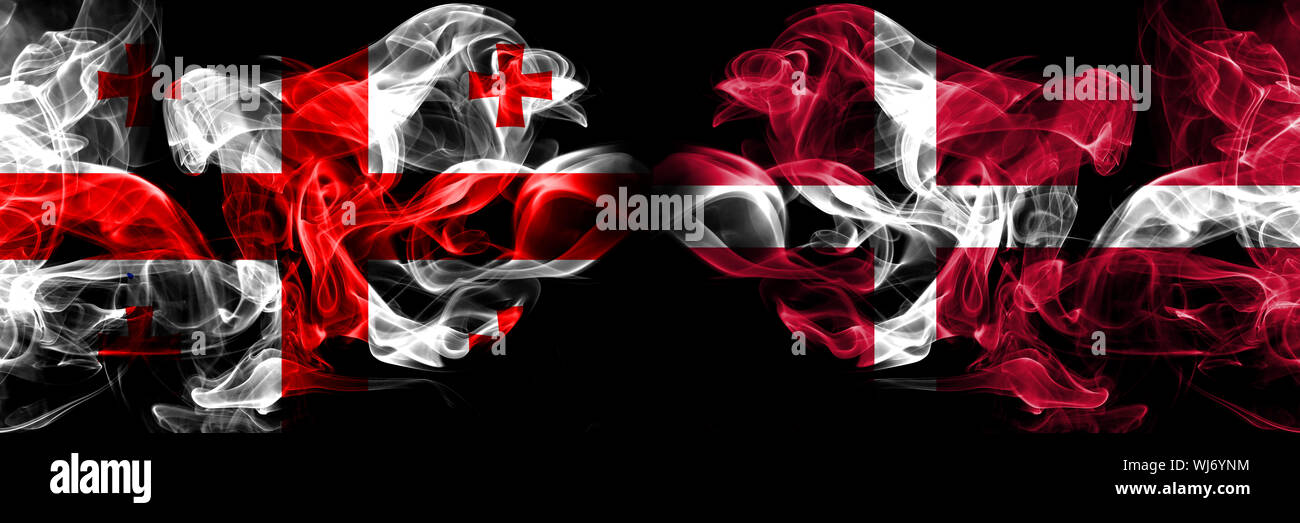 Denmark, Georgia competition thick colorful smoky flags. European ...