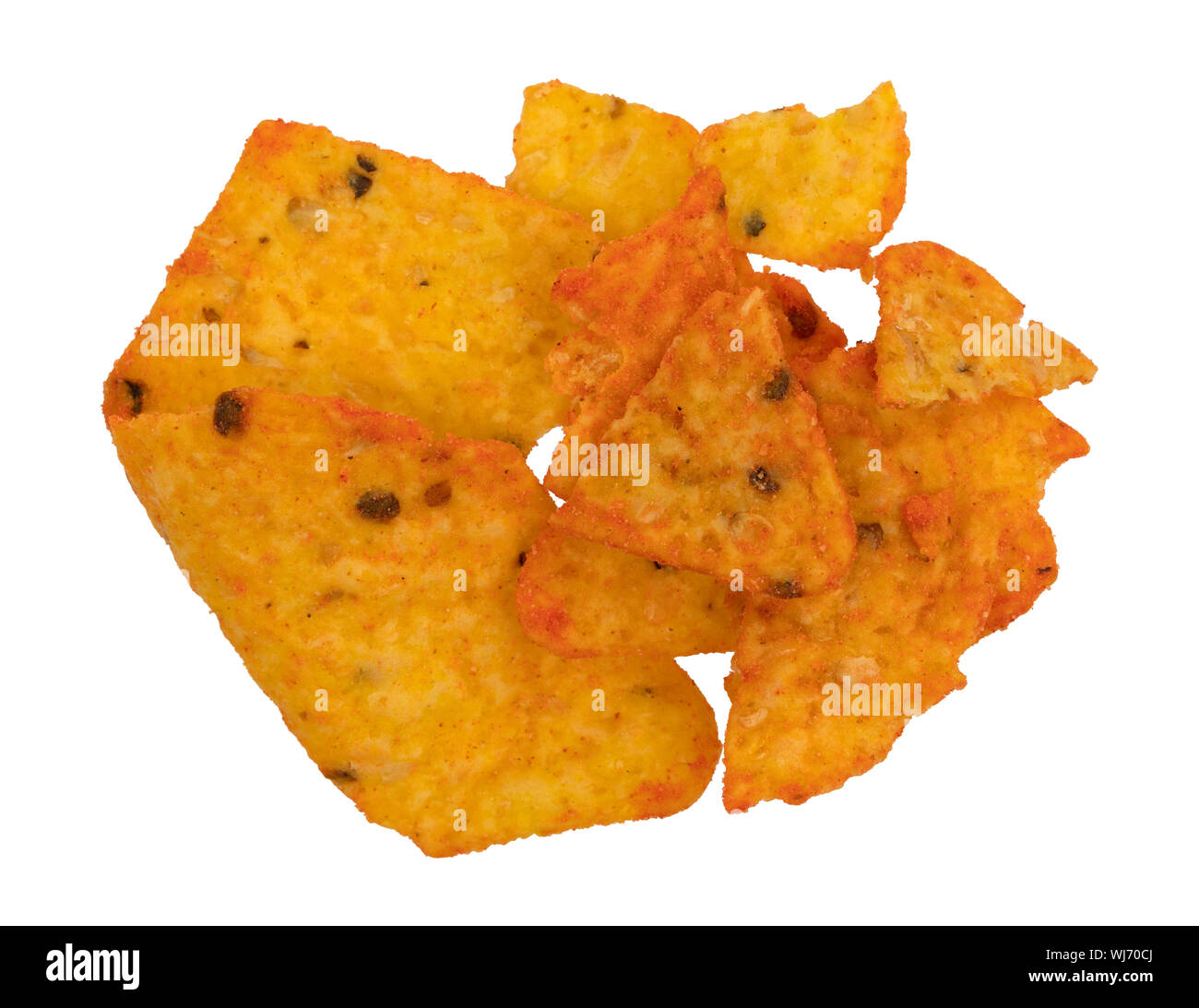 Top view of a group of broken cheese flavored tortilla chips isolated ...
