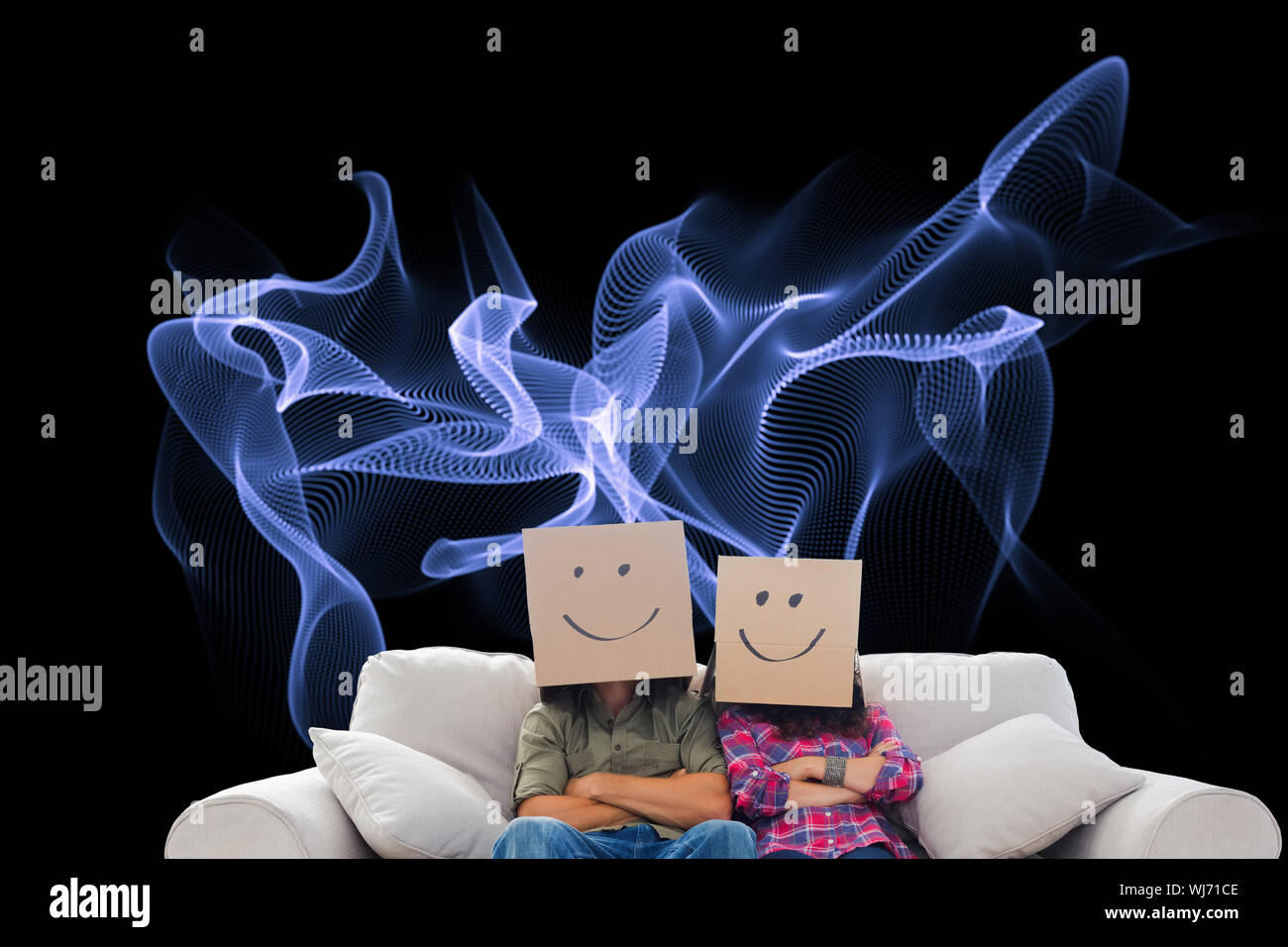 Composite image of silly employees with arms folded wearing boxes on ...