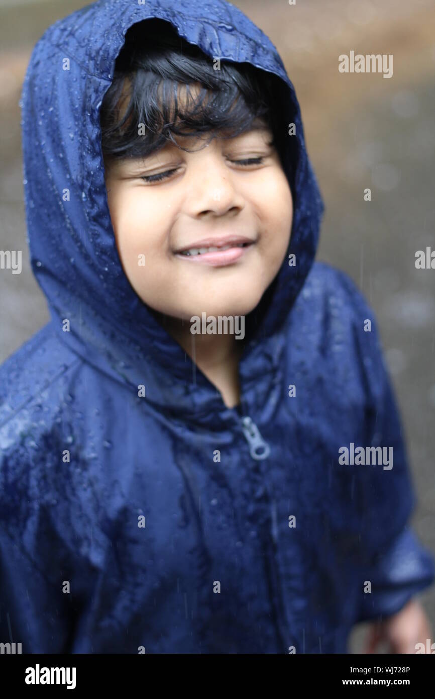 Boy enjoying rain hi-res stock photography and images - Alamy