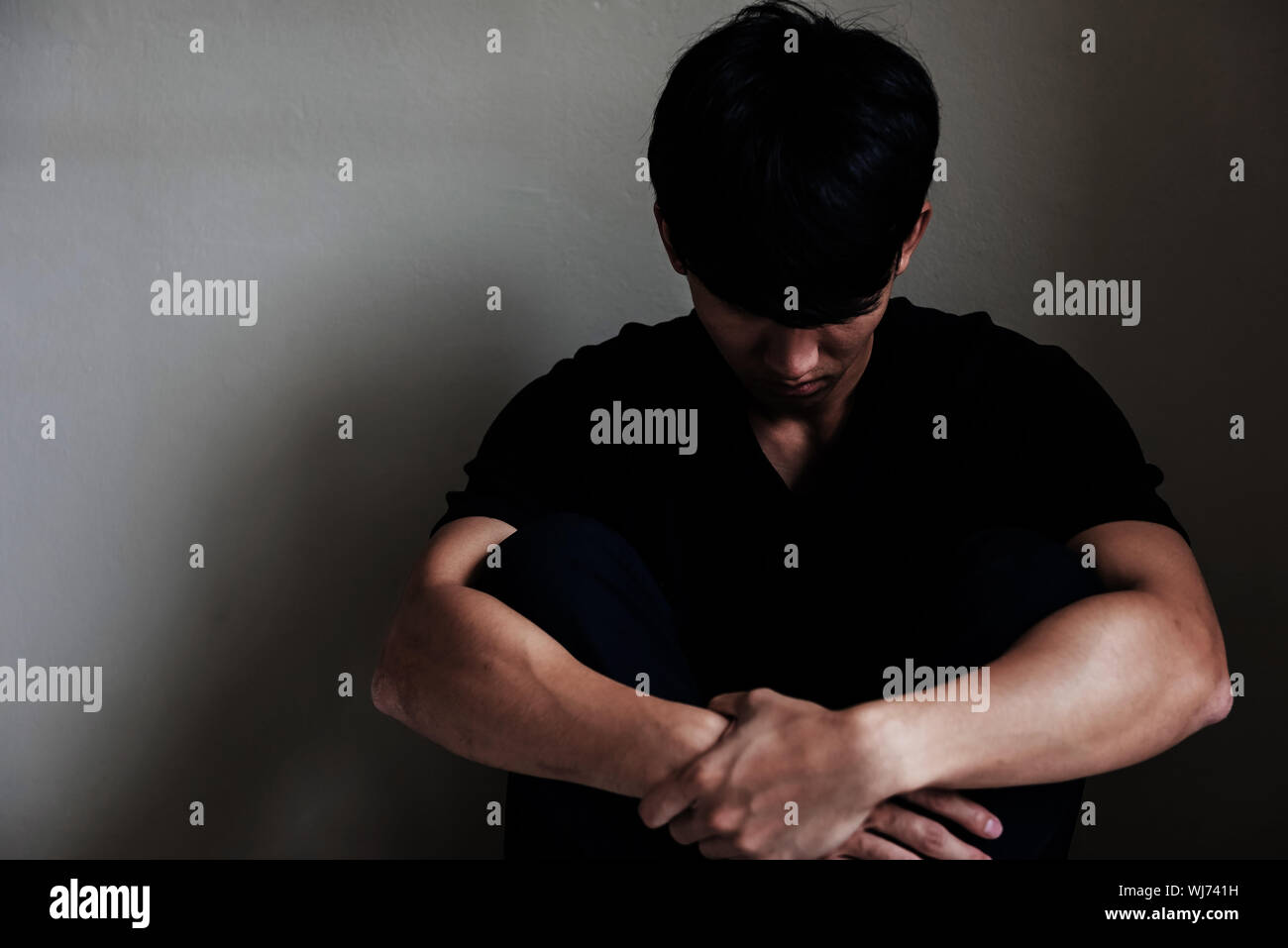 Black person shadow sad hi-res stock photography and images - Alamy