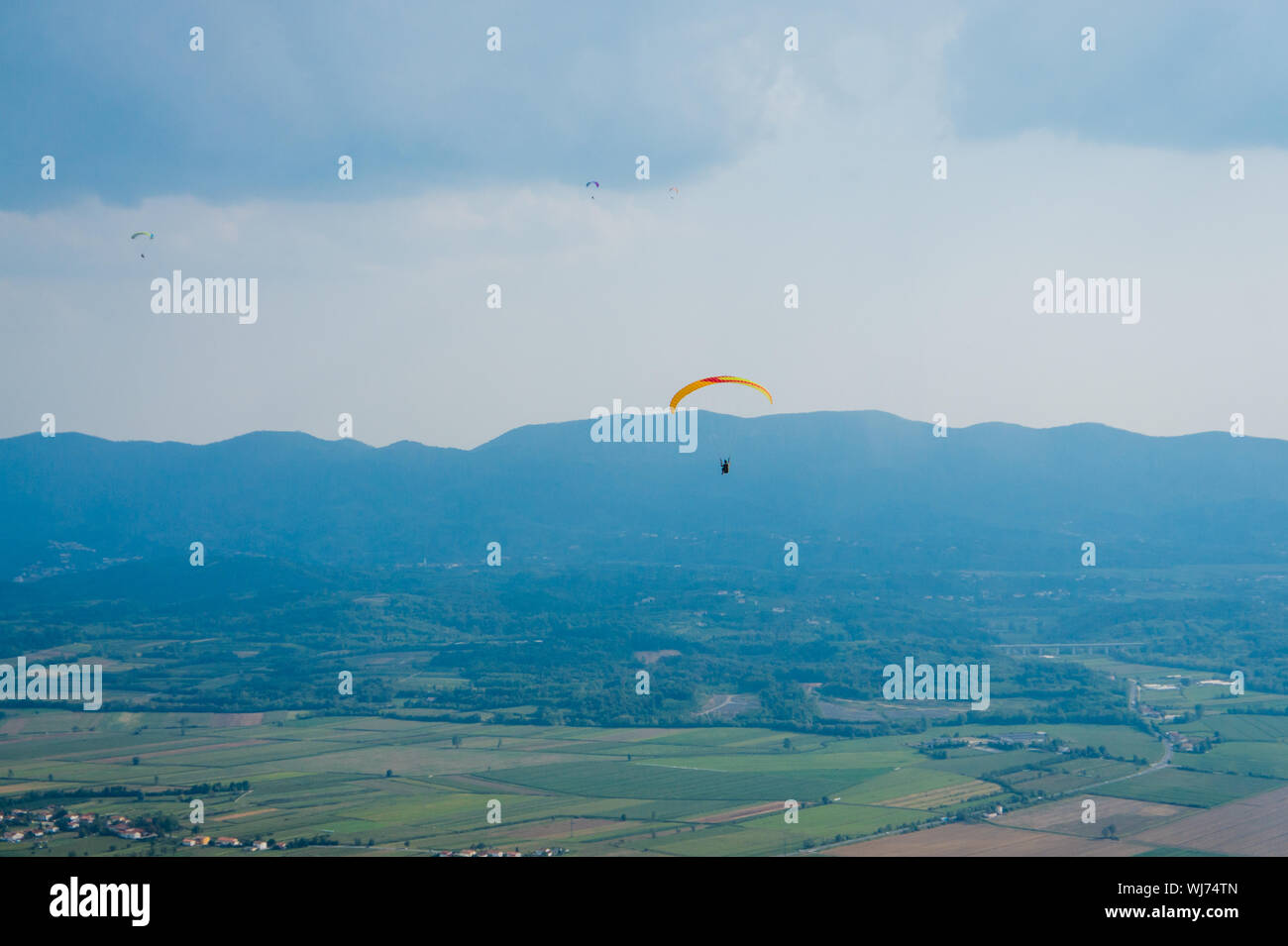 Paraglider flying. Sunset. Top view. Dream to fly Stock Photo - Alamy