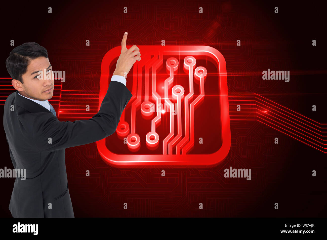 Composite image of stern asian businessman pointing Stock Photo - Alamy