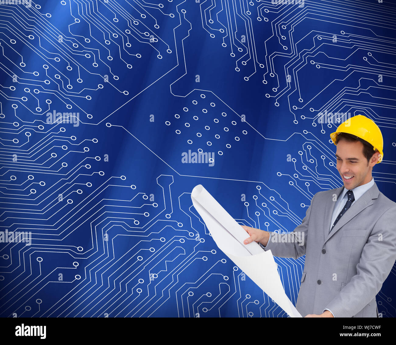 Composite image of smiling architect with hard hat looking at plans on ...