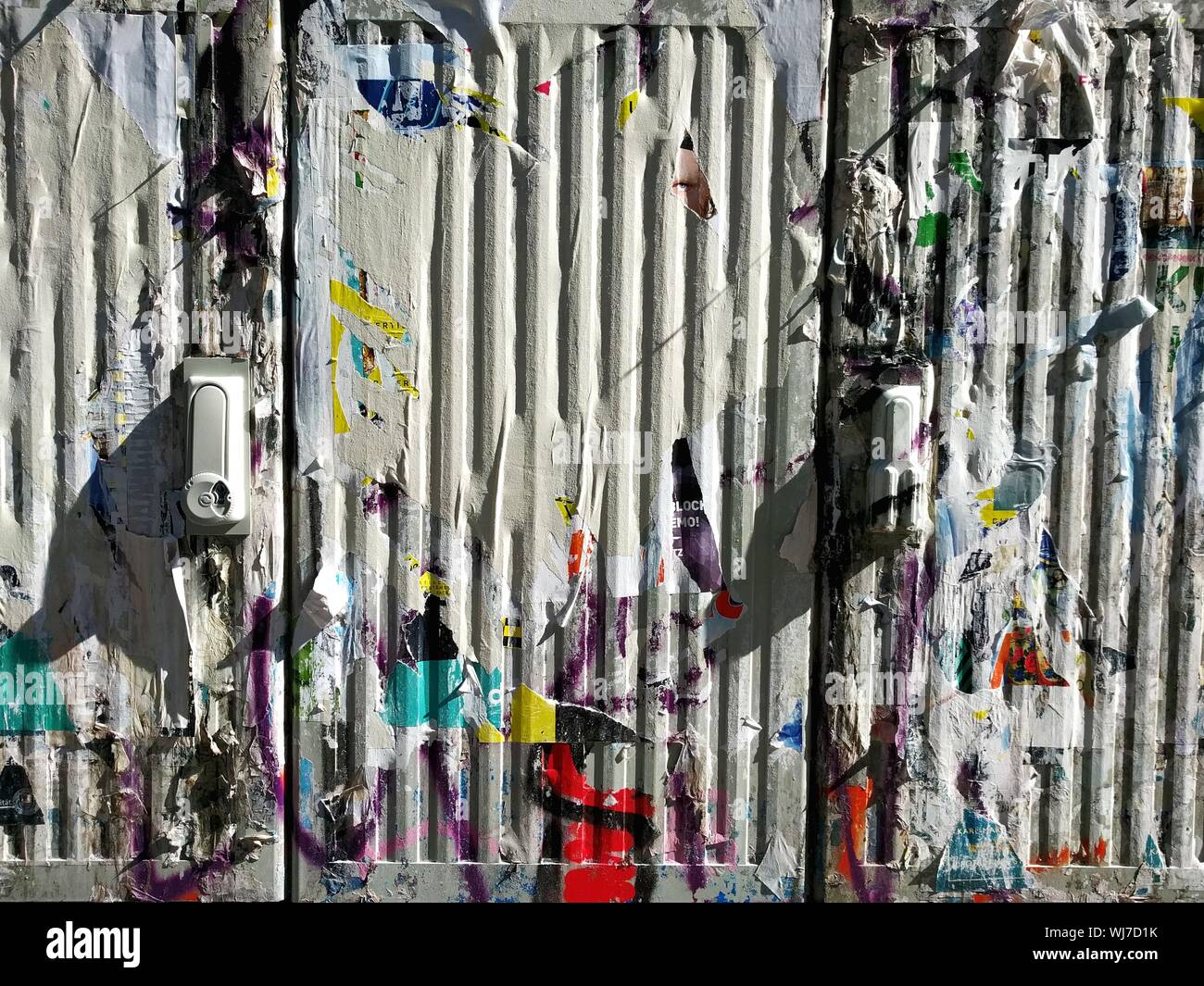 Torn posters on wall hi-res stock photography and images - Alamy