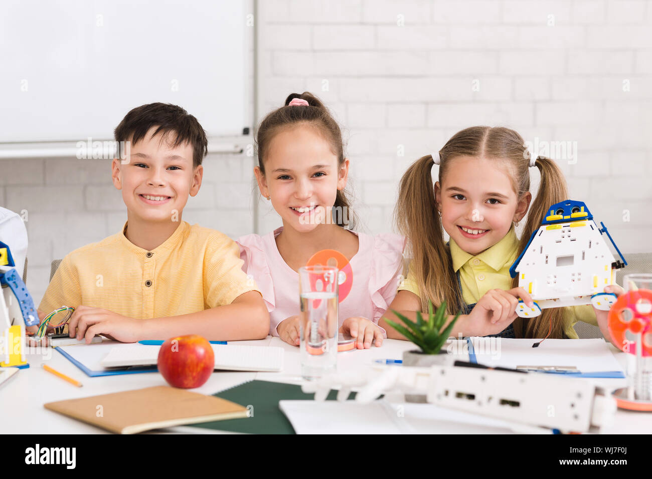 Pupils building robots in after school stem class Stock Photo - Alamy