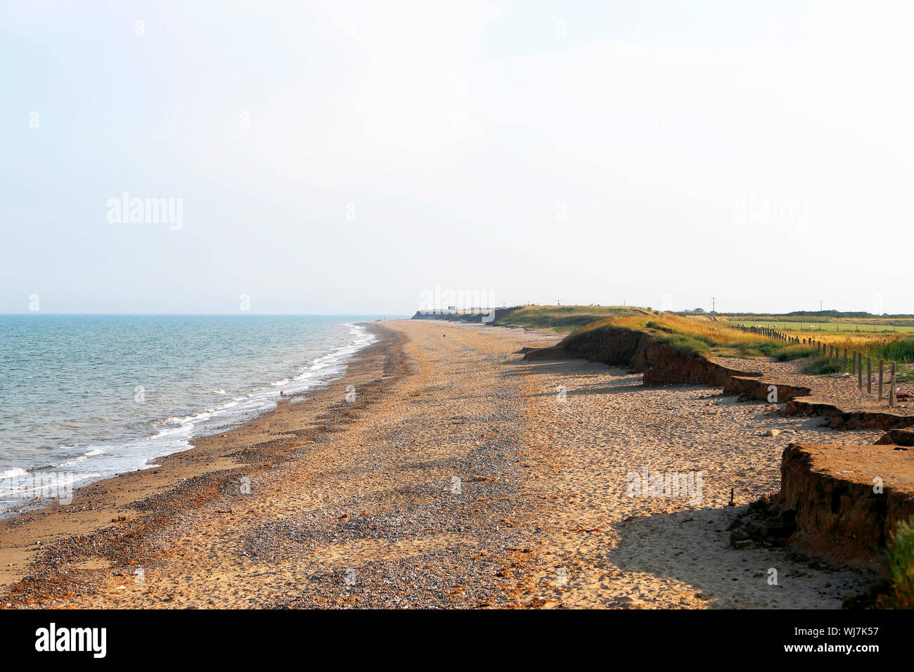 A wonderful tranquil Kilnsea beach looking south towards Spurn Point on ...
